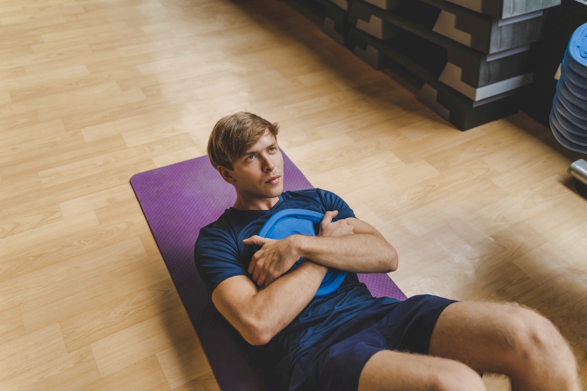Get Started: Sit Up (Weighted) - Gym.com
